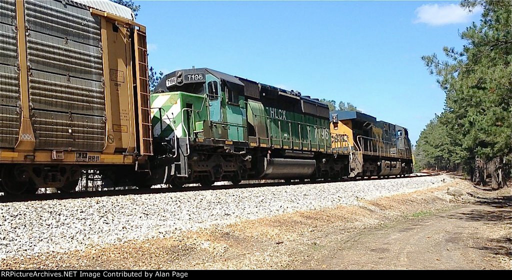 CSX ES40DC 5388 and HLCX SD40-2 7196 head NB